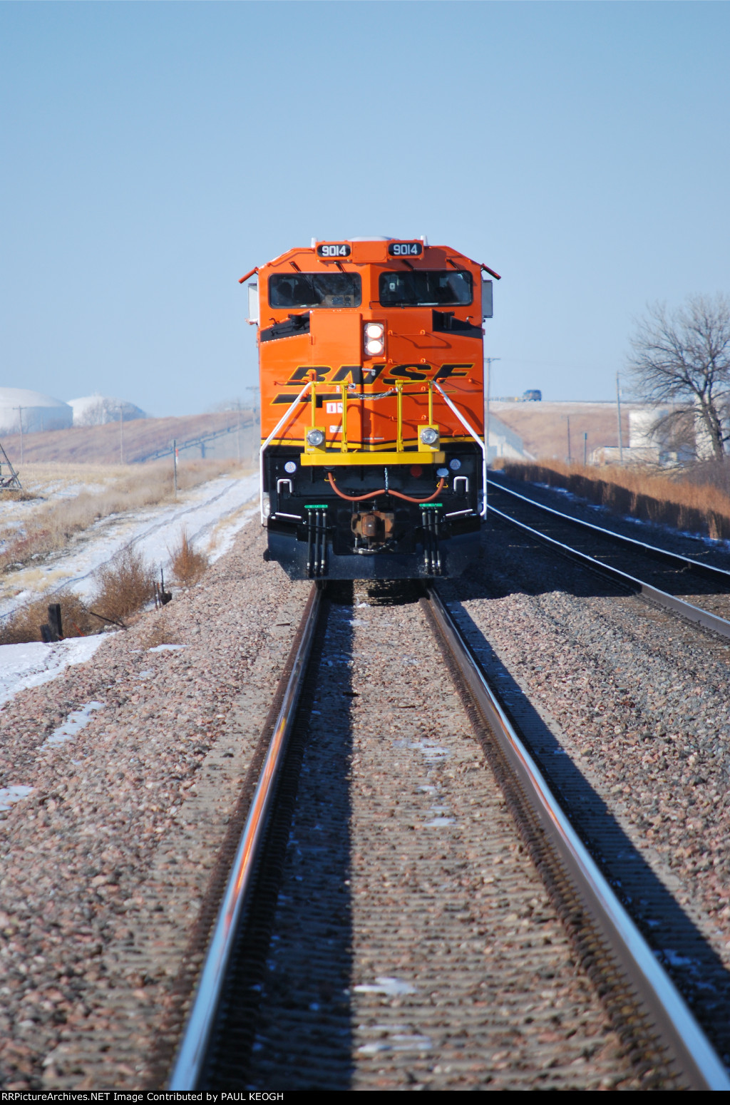 BNSF 9014 Head on Shot from the railroad crossing just west of Aurora, NE with Nebraska Highway ...